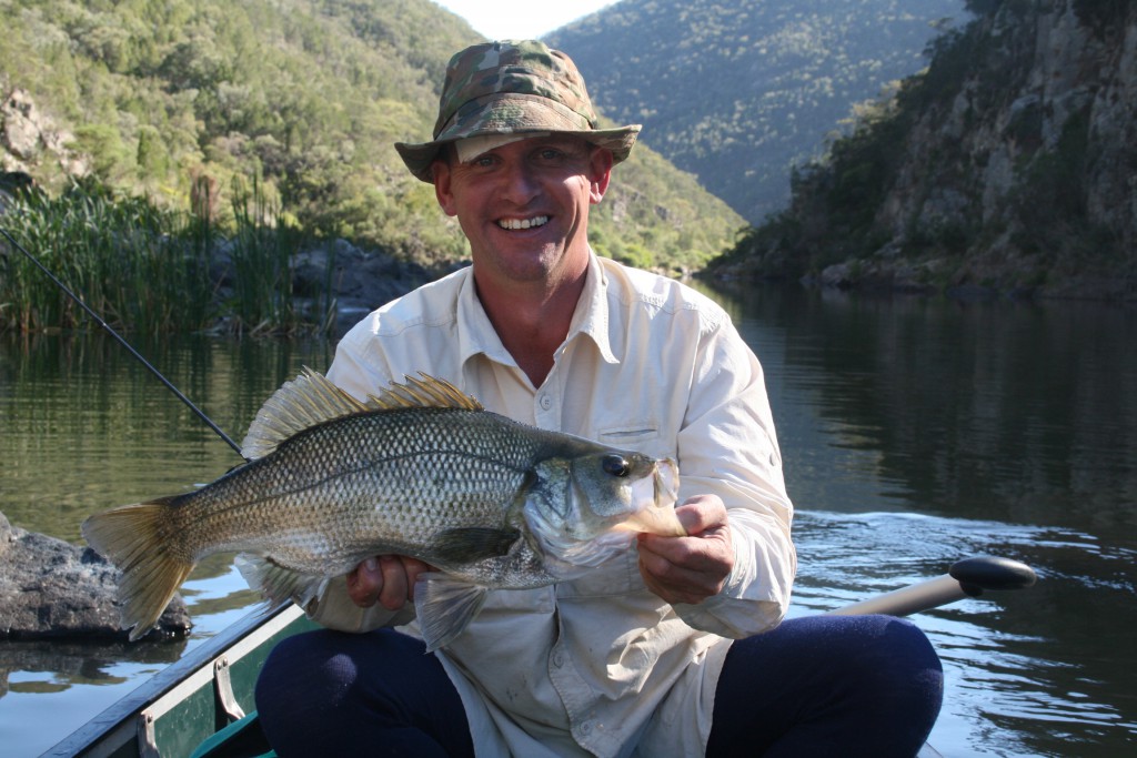 Tim Fletcher with an Australian Bass caught on the Snowy River – Upper ...